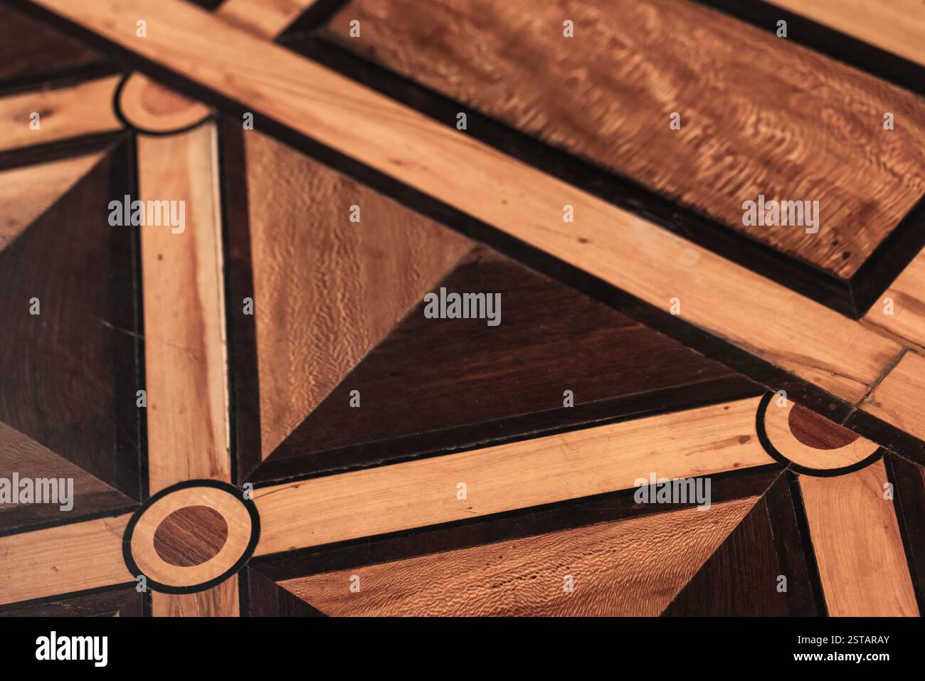 An artistic close-up of a parquet floor showcasing detailed ...