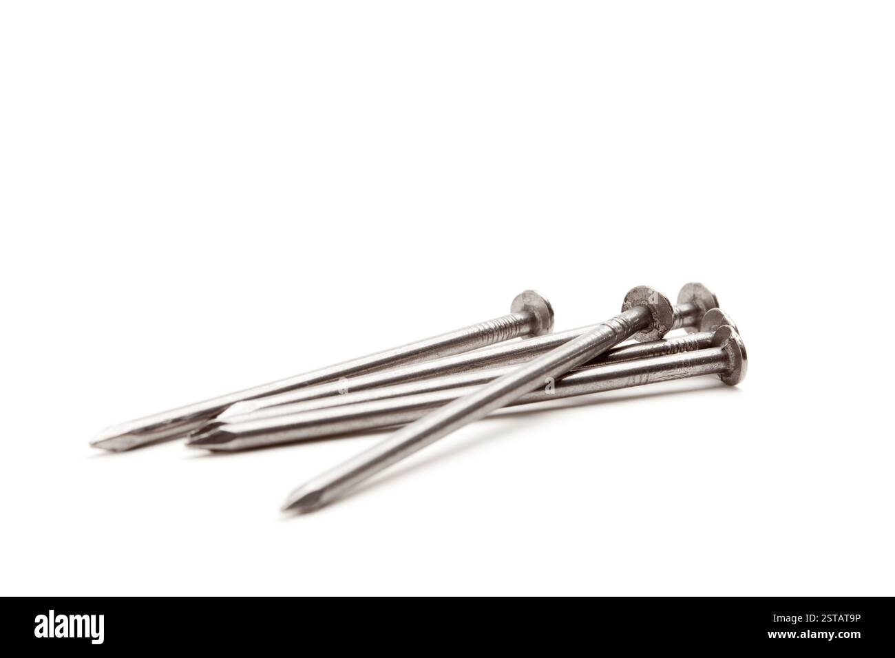 Construction Nails Isolated on a White Background Stock Photo - Alamy