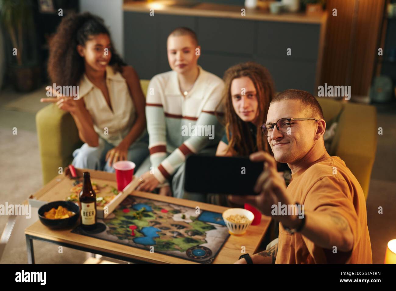 Celebrating Game Night with Friends and Board Game Stock Photo - Alamy