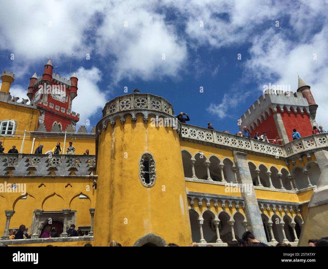 Pena Palace, Sintra, Portugal. Bright yellow exterior with red turrets ...