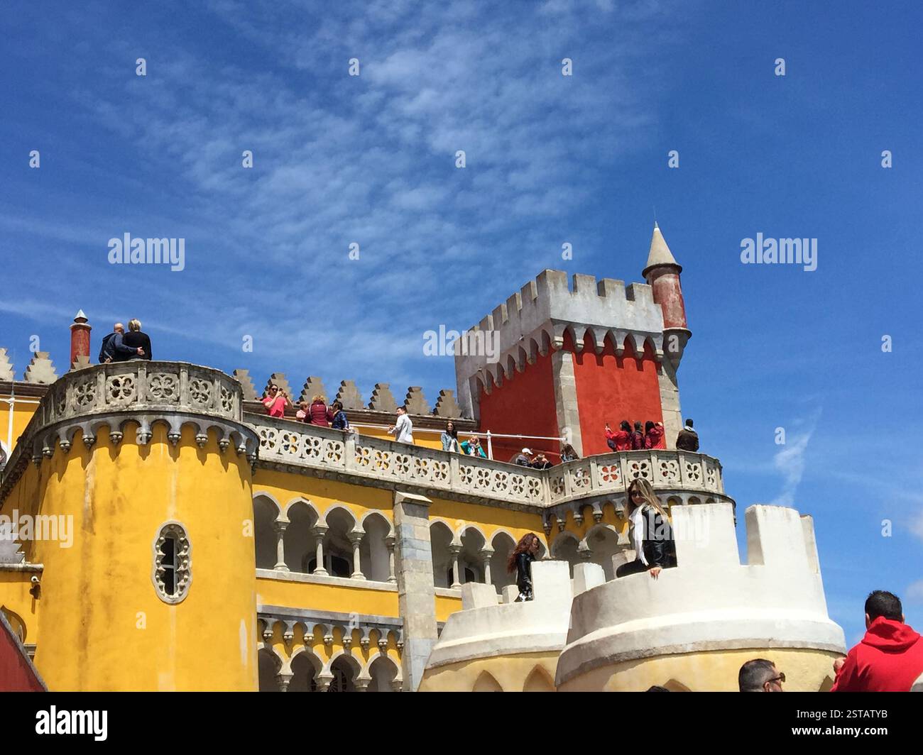 Pena Palace, a brightly colored fairytale castle perched atop a hill in ...