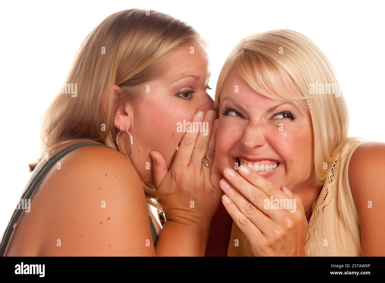 Two Blonde Woman Whispering Secrets Isolated on a White Background ...
