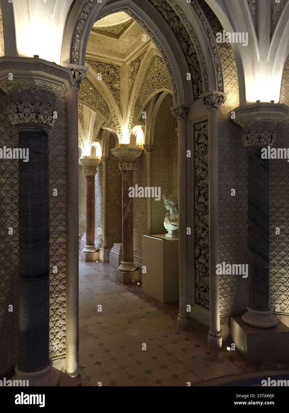 Corridor. Ornate arched ceilings and columns. Intricate floral patterns ...