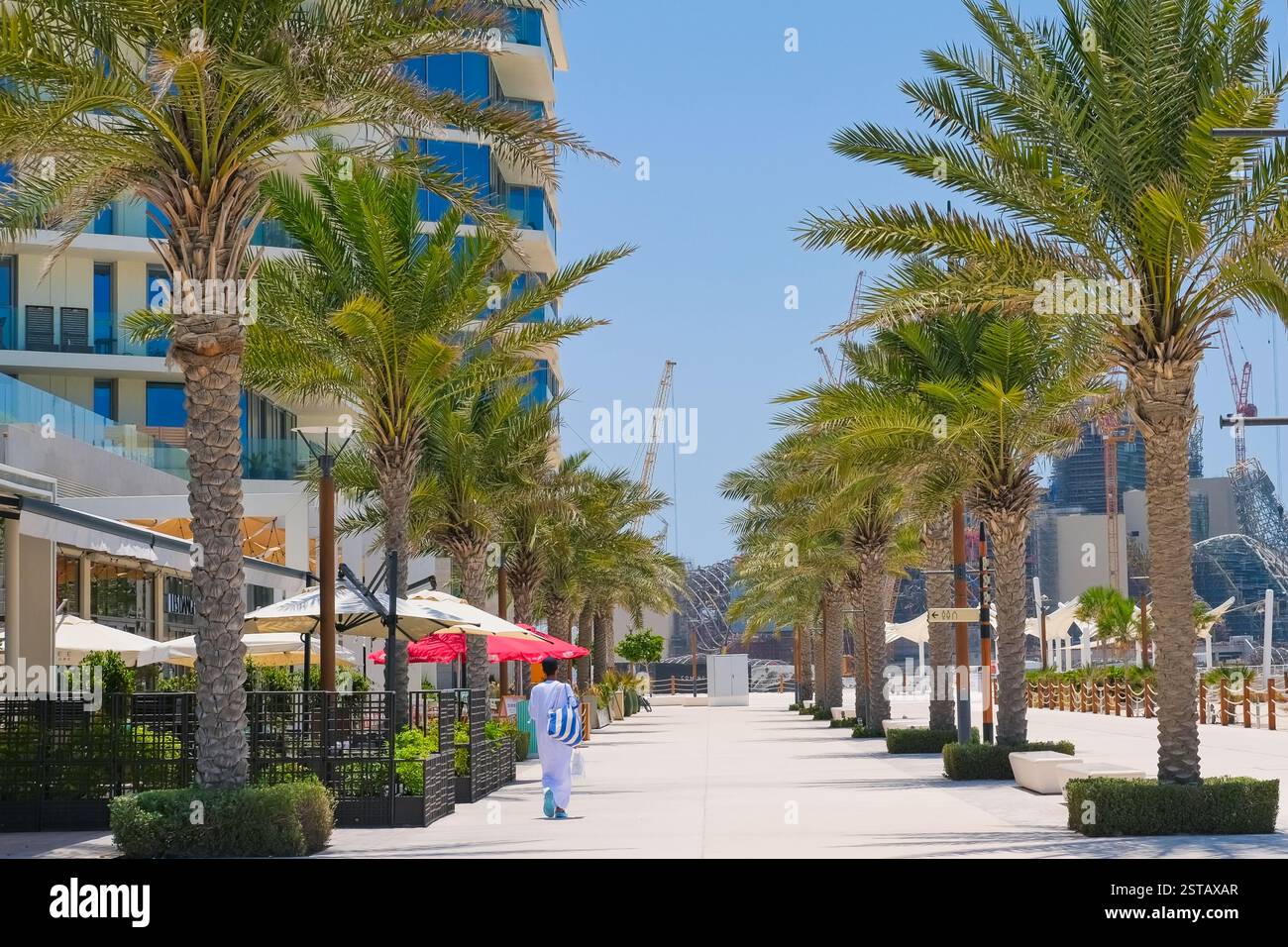 Abu Dhabi, UAE - June 26,2024: Cityscape with landscaped green ...