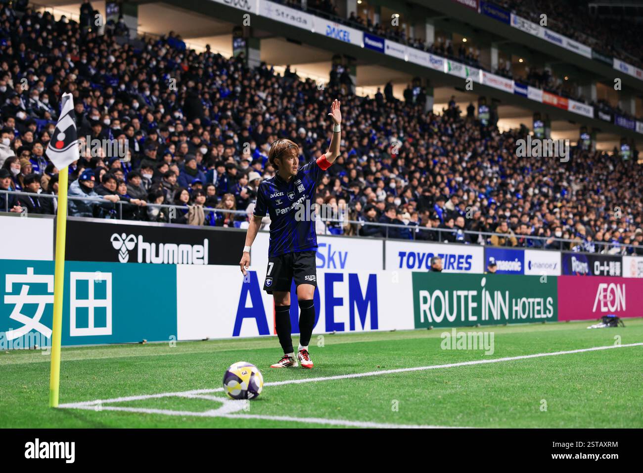 Osaka, Japan. 14th Feb, 2025. Gamba Osaka's Takashi Usami takes a ...