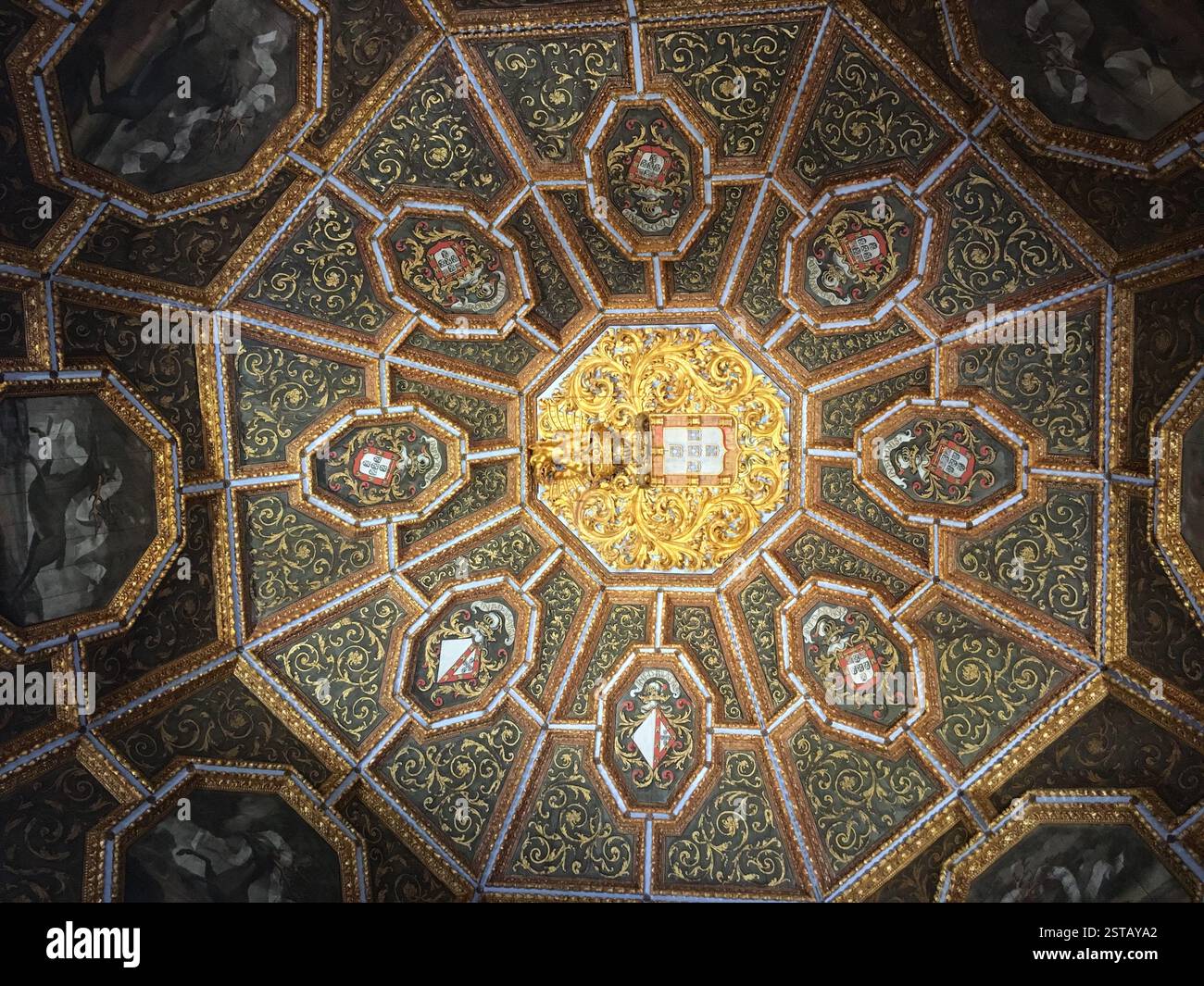Ceiling, ornate gold and dark wood geometric patterns, central golden ...