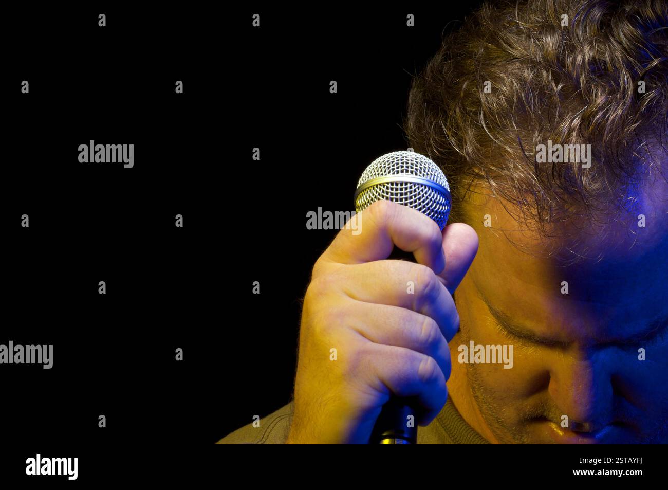 Passionate Vocalist & Microphone Stock Photo - Alamy