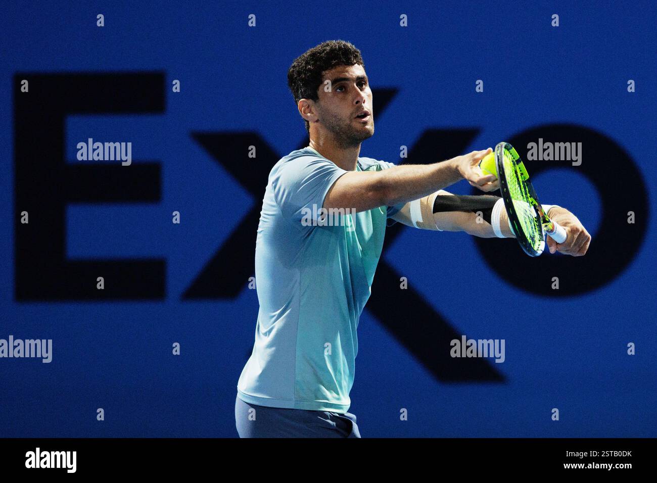Aziz Dougaz of Tunisia during the 2025 Qatar ExxonMobil Open, ATP 500 ...