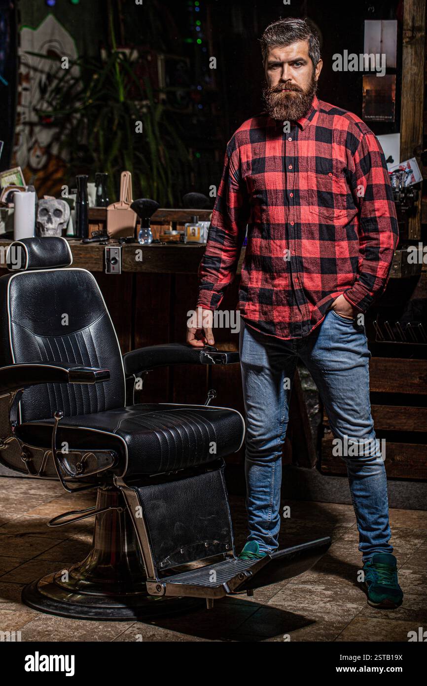 Confident male hairdresser standing chair hi-res stock photography and ...