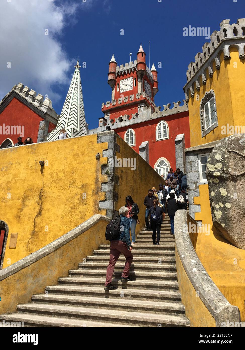 Pena Palace, Portugal: A vibrant castle perched atop a hill, its ...