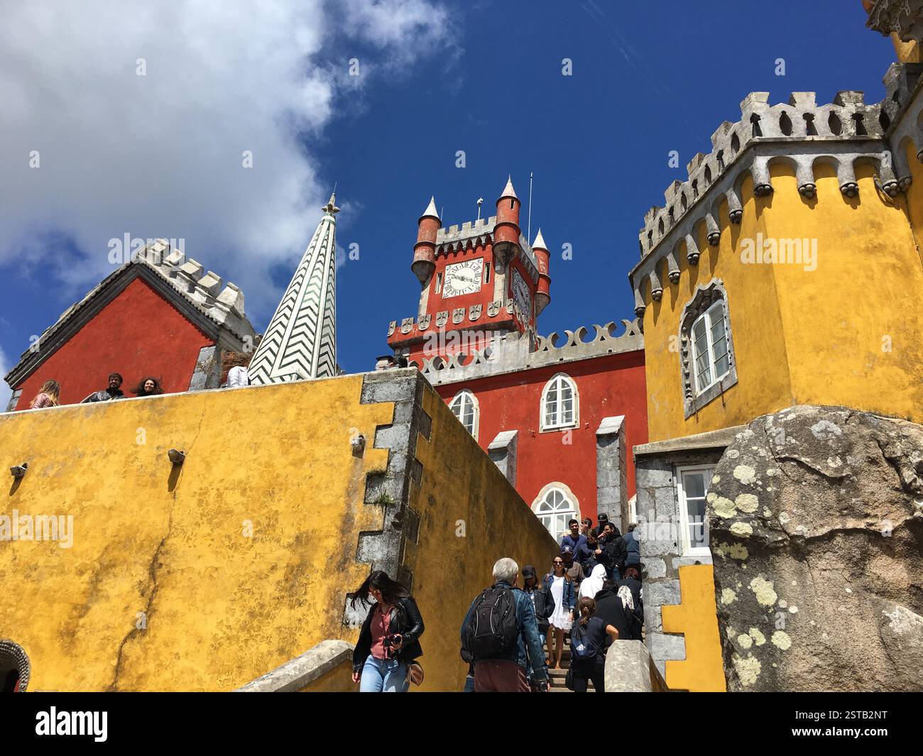 Pena Palace: A vibrant castle perched atop a hill, showcasing intricate ...