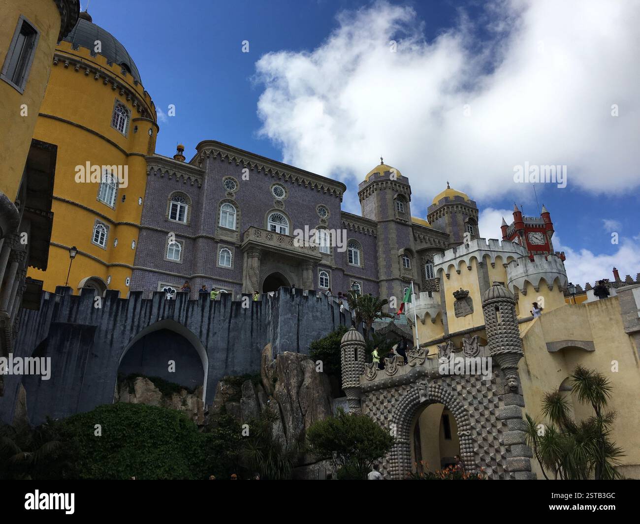 Pena Palace. Vibrant fairytale castle perched atop a hill ...
