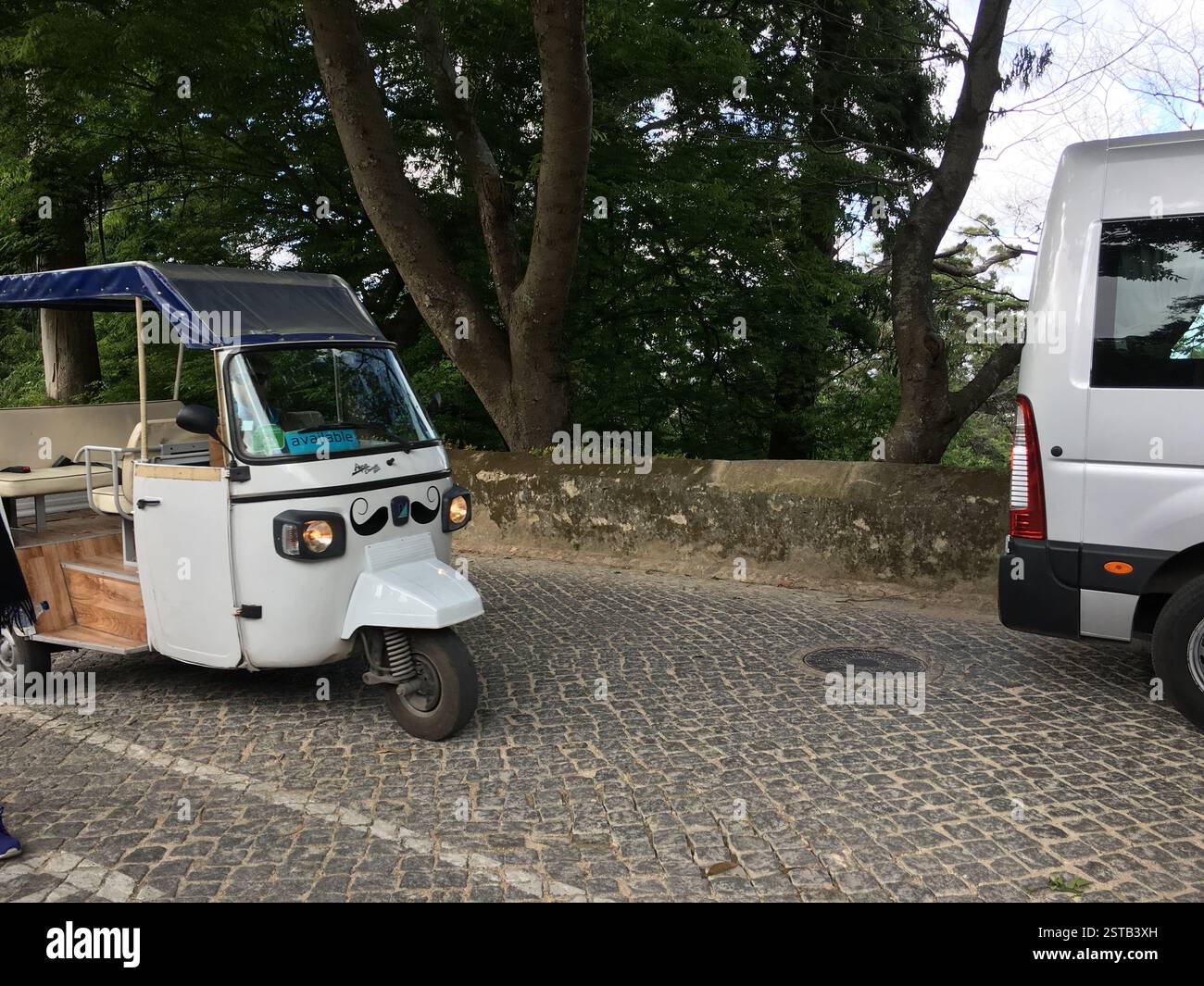 Tuk Tuk in Sintra, Portugal. Three-wheeled auto rickshaw with blue ...
