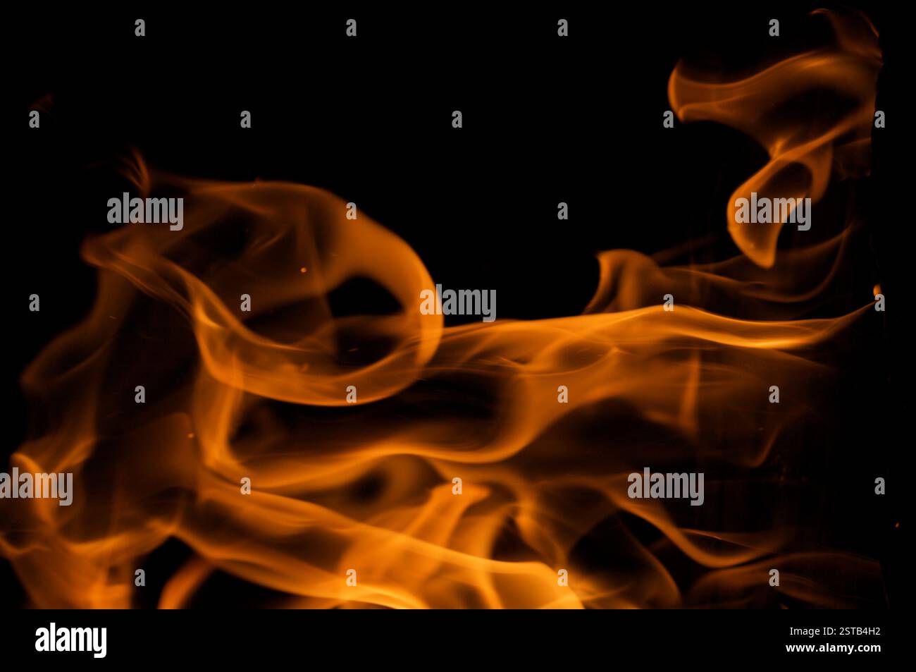 Fire against dark backdrop hi-res stock photography and images - Alamy