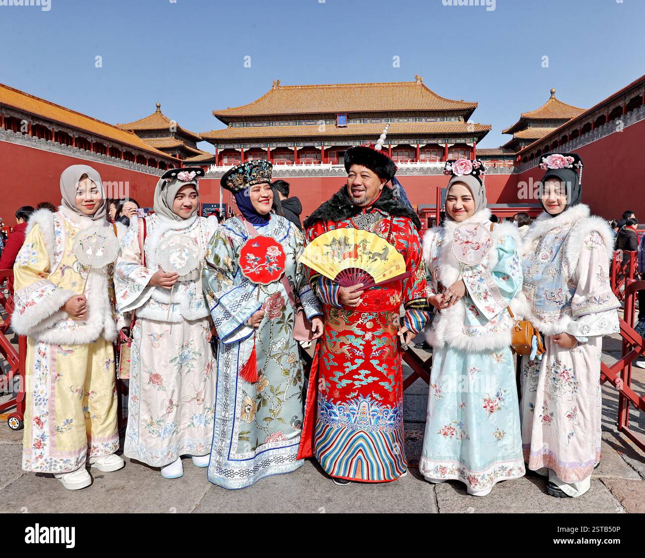 Foreign tourists visit the Palace Museum in Beijing, China, 15 February ...