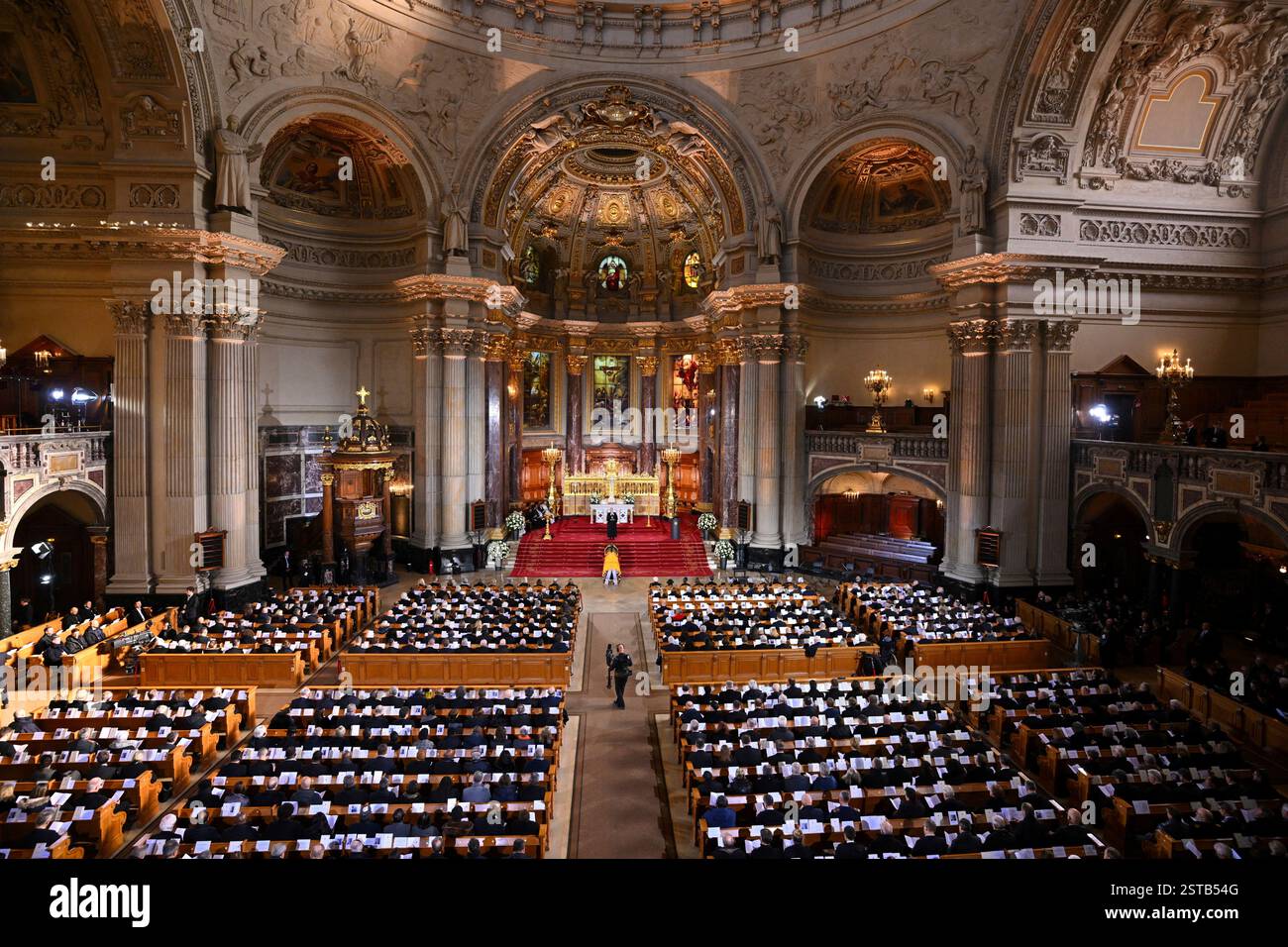A flag-draped coffin, centre, of former German President Horst Koehler ...