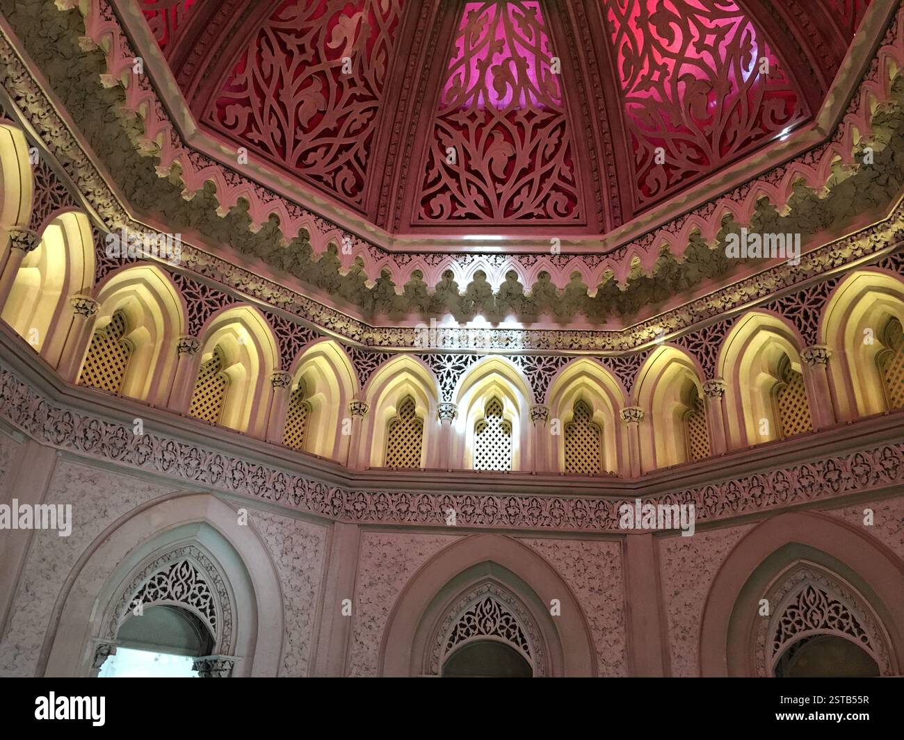 Beautiful domed ceiling with intricate Moorish designs and warm ...