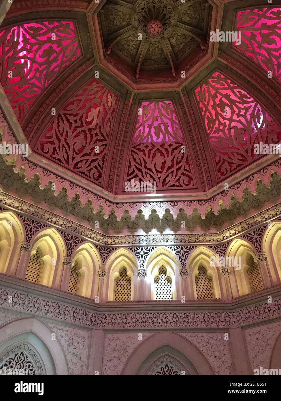 Beautiful domed ceiling with intricate pink and gold patterns. Richly ...