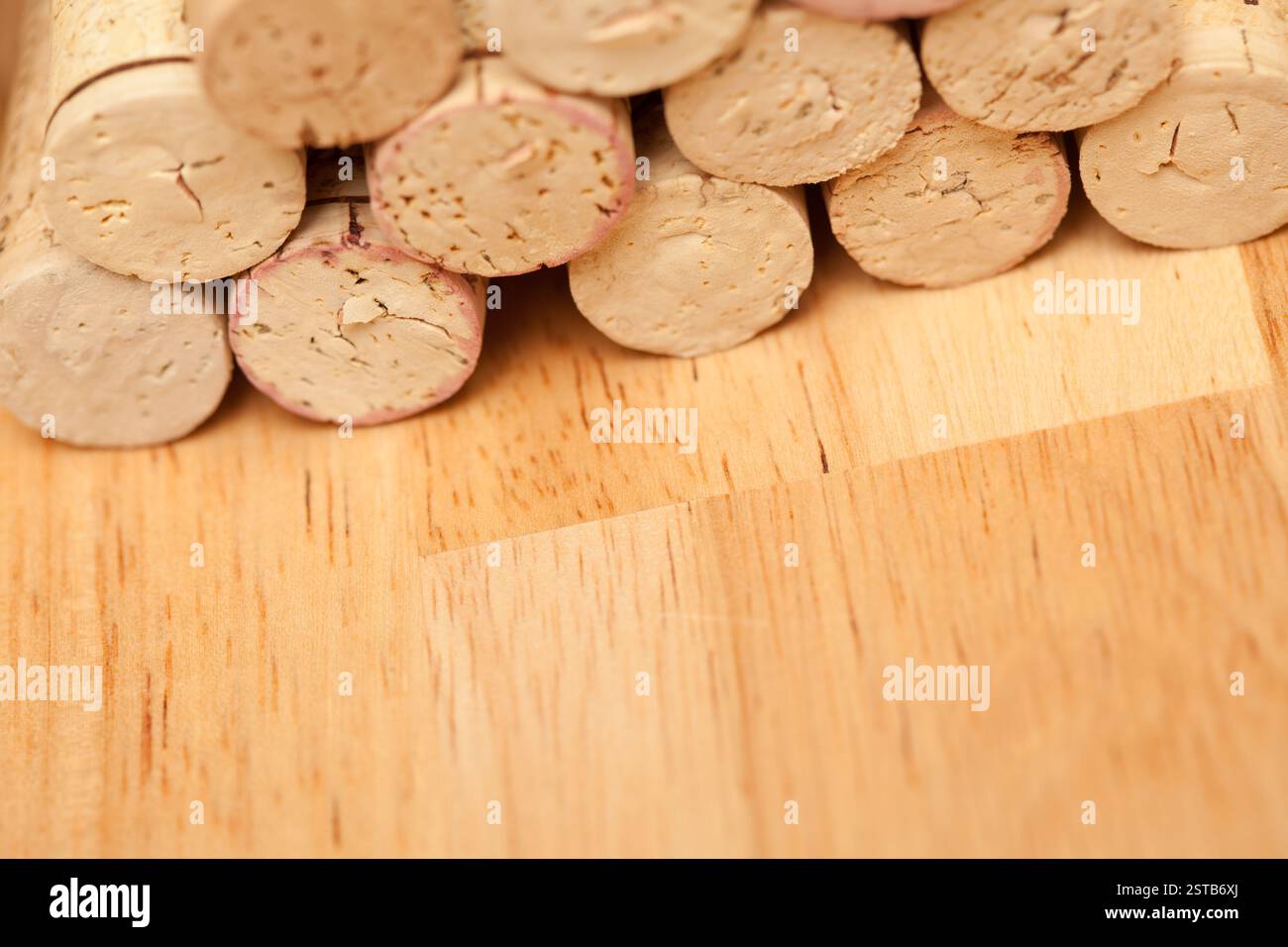 Stack of Wine Corks on a Wood Surface Stock Photo - Alamy