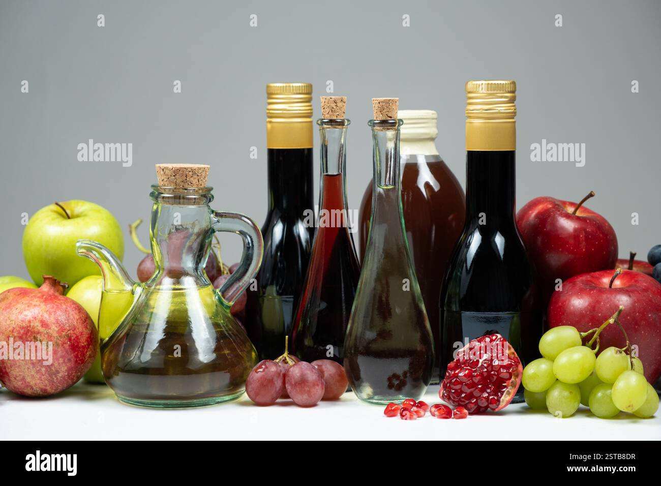 Different types of vinegar, apple, balsamic, wine and pomegranate ...