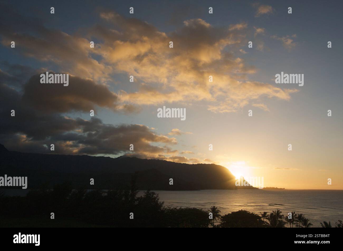 Beautiful sunset over silhouetted mountain hi-res stock photography and ...