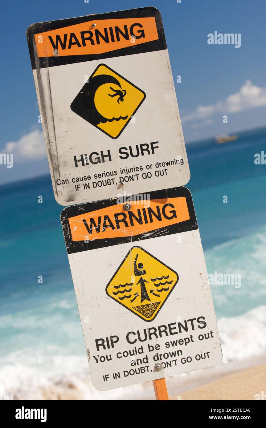 Surf and Currents Warning Sign on a beach in Hawaii Stock Photo - Alamy