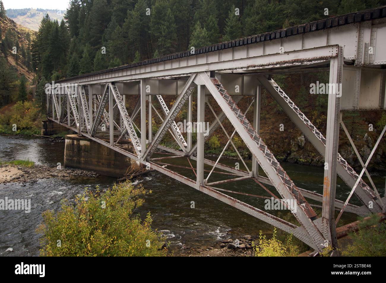Iron Train Bridge Over Mountain River Stock Photo - Alamy