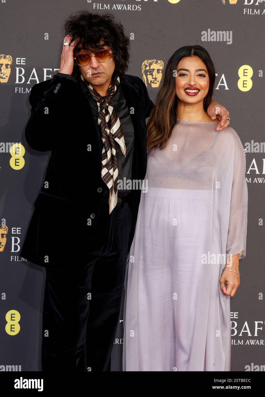 London, UK. 16th Feb, 2025. Karan Kandhari and Radhika Apte attend the ...