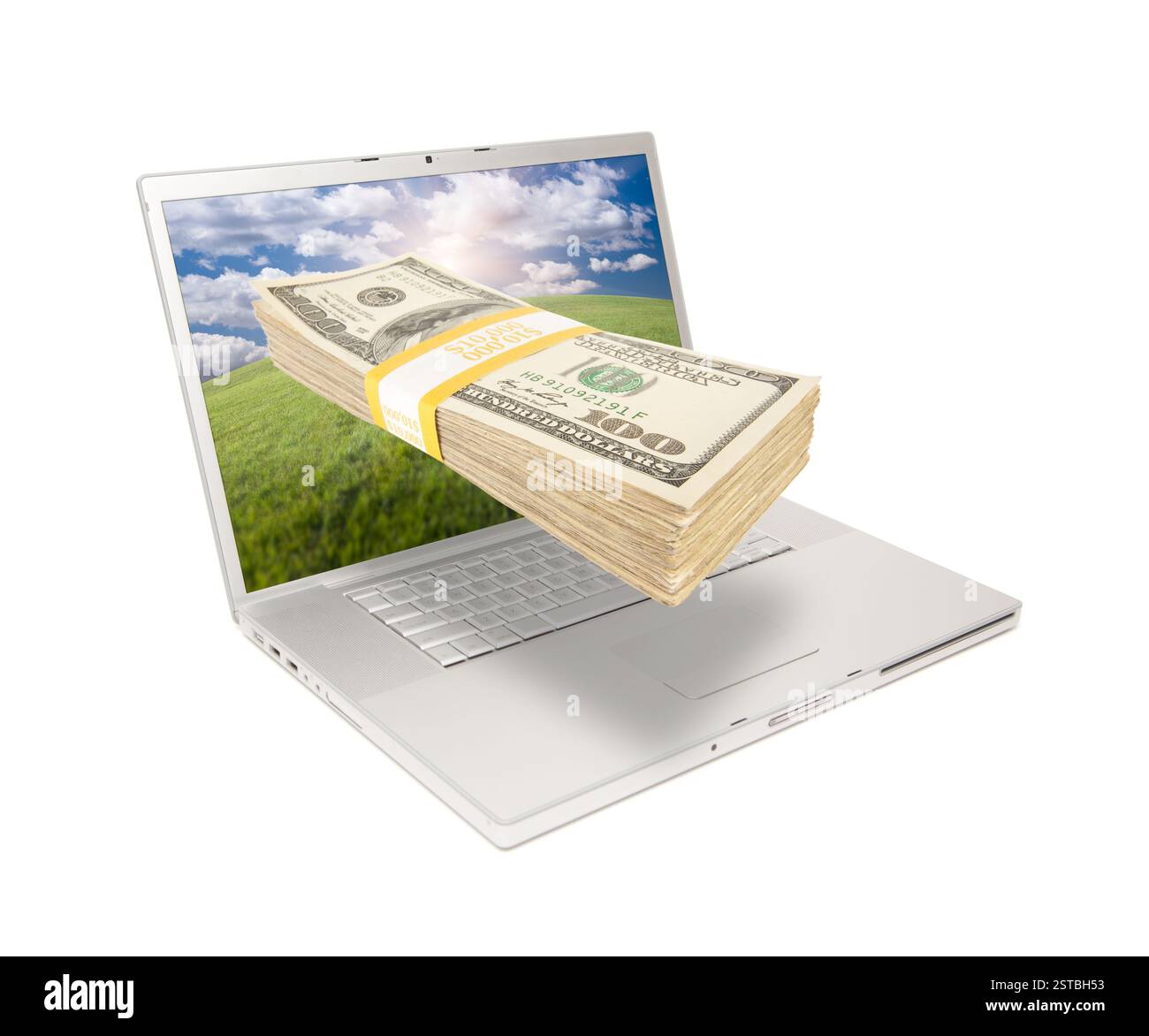Silver Computer Laptop Isolated on White with Stack of Hundred Dollar ...