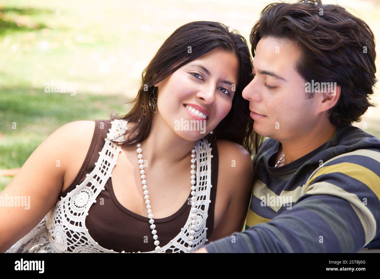 Attractive Hispanic Couple Portrait Outdoors Stock Photo - Alamy