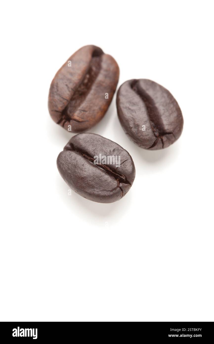 Three roasted coffee beans hi-res stock photography and images - Alamy