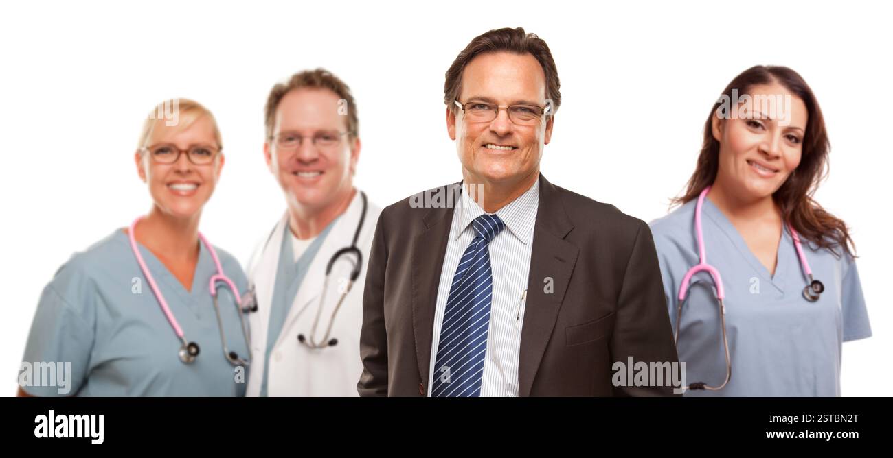 Smiling Businessman with Male and Female Doctors and Nurses Stock Photo ...