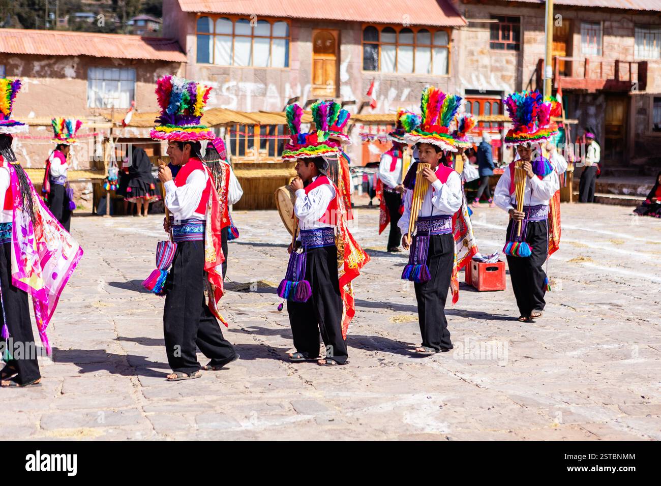 Peruvian local people from Taquile Island doing a traditional dance ...
