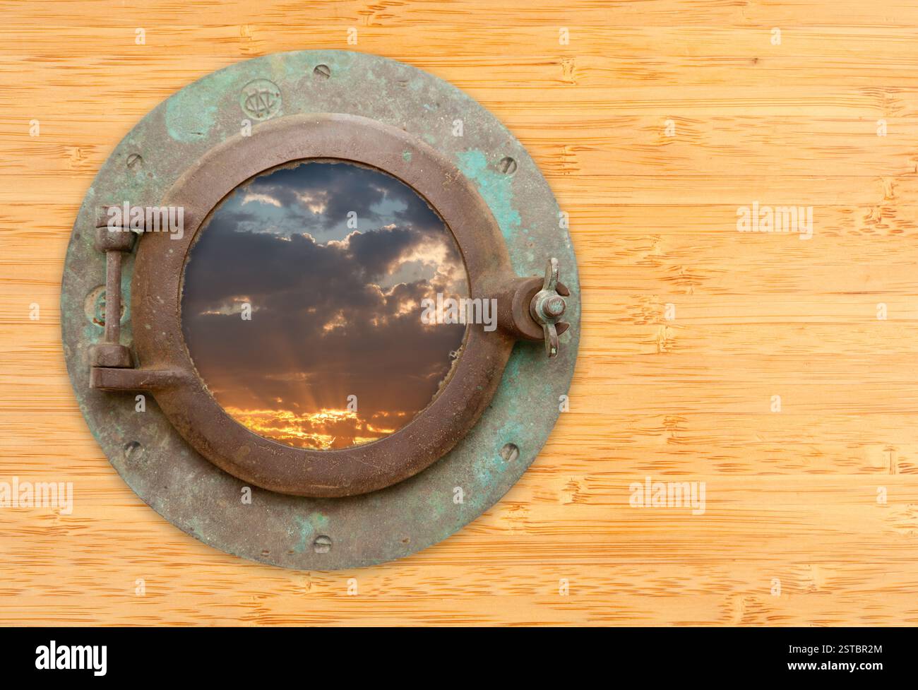 Antique Porthole with View of Sunset on a Bamboo Wall Background Stock ...