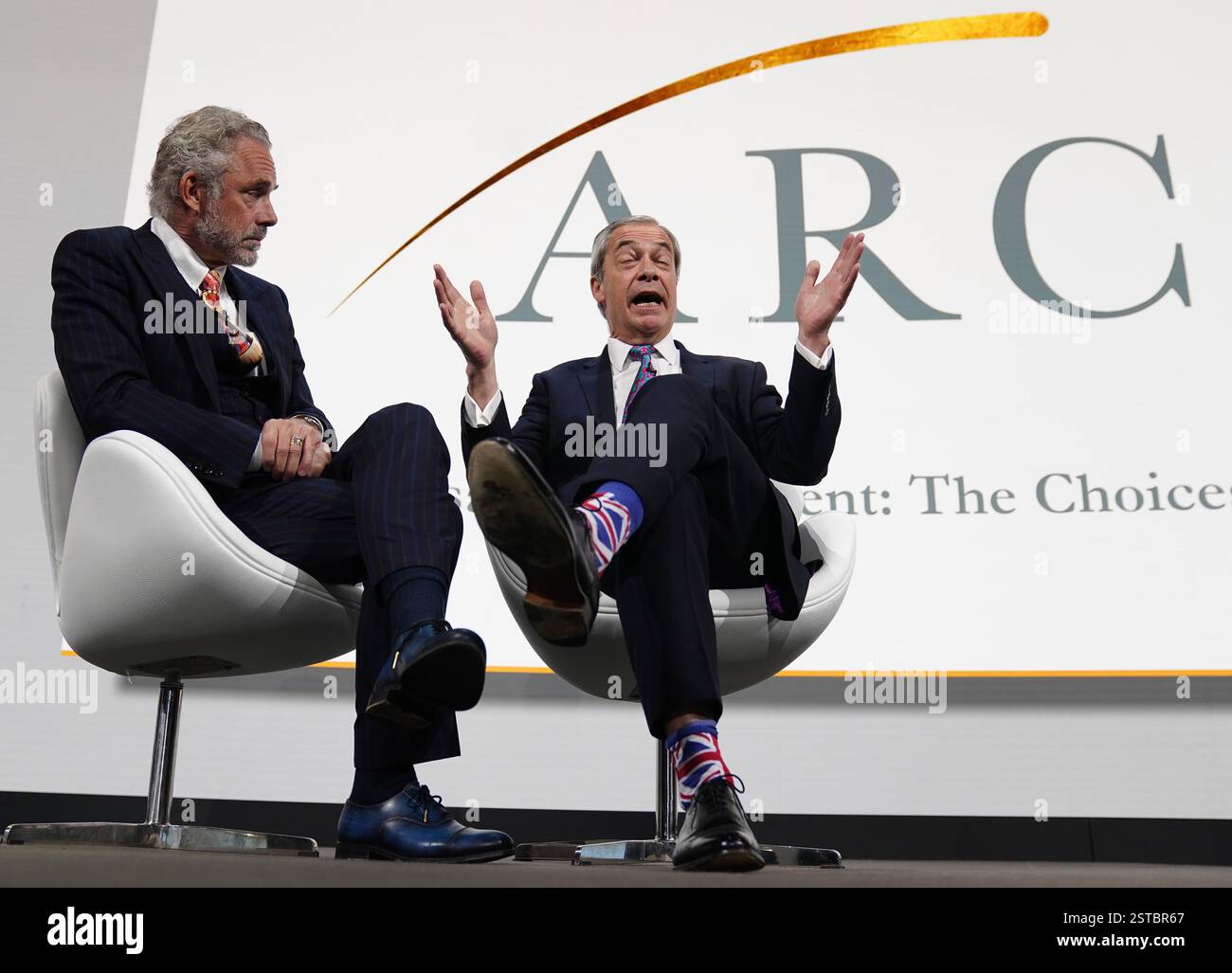 Reform UK leader Nigel Farage (right) is interviewed by Jordan Peterson ...