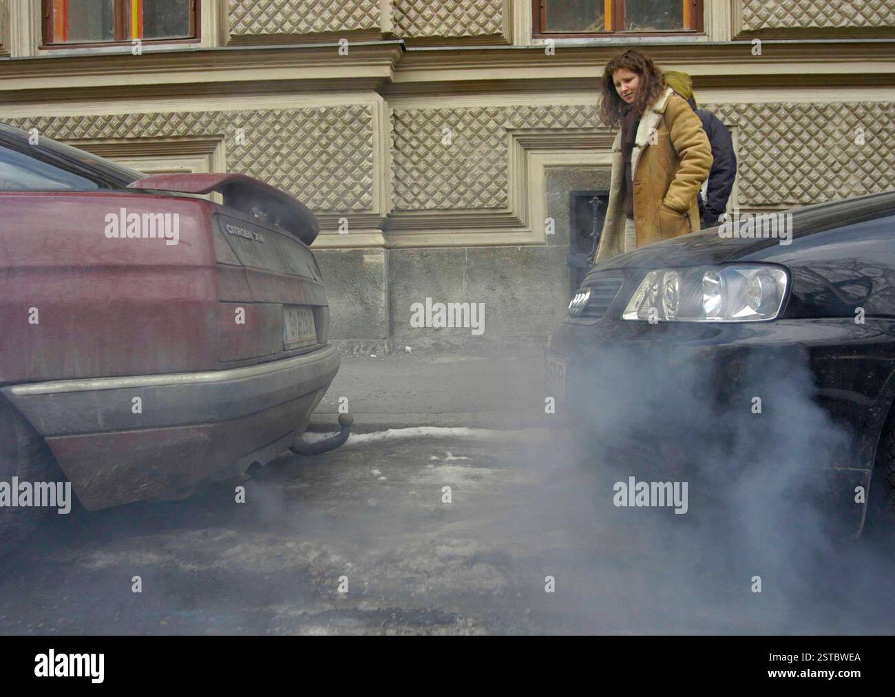 Air pollution and particulates caused by car exhaust gases, cloud of ...