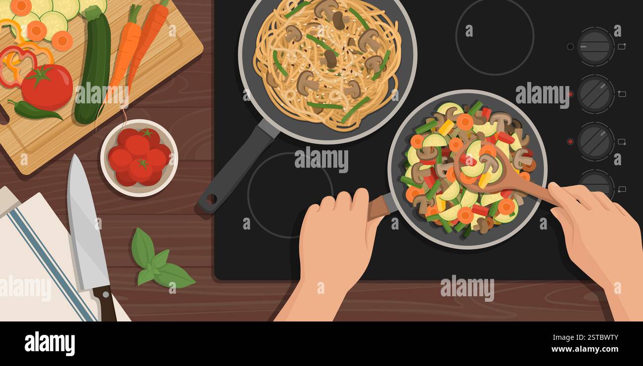 Woman cooking vegetables in a pan and preparing lunch, kitchen worktop ...