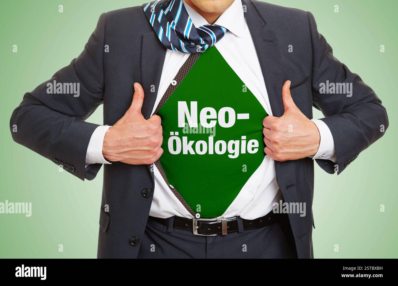 Businessman shows lettering Neo-Ökologie (German for: Neo-Ecology ...