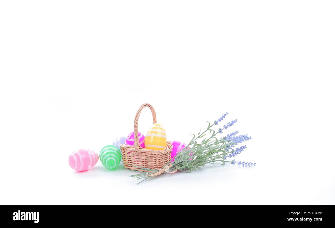 Ester is coming. Easter basket and Easter Eggs on a pure white ...