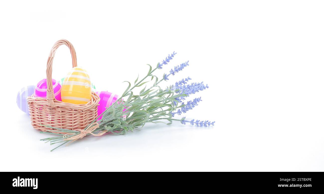 Ester is coming. Easter basket and Easter Eggs on a pure white ...