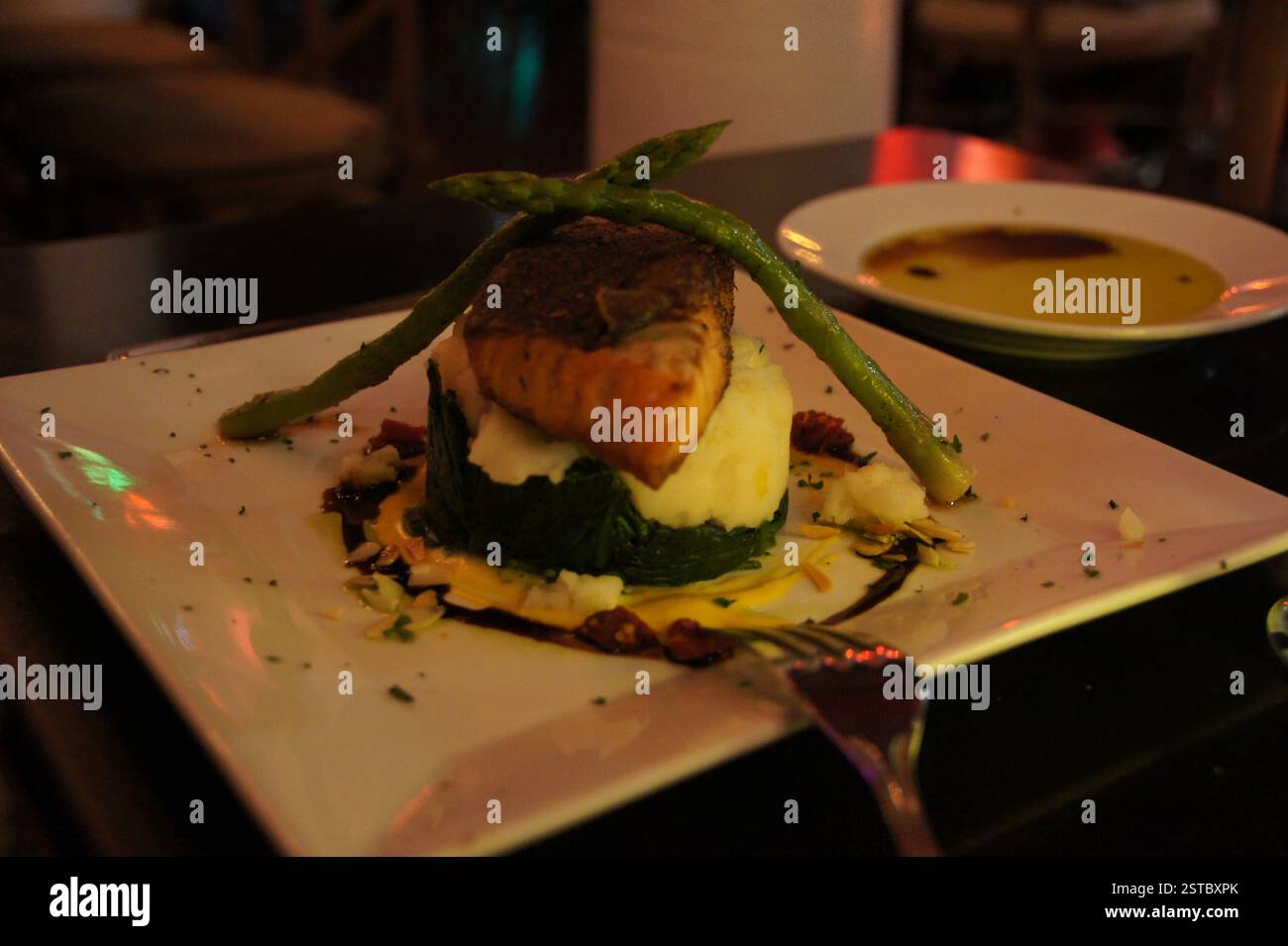 A delicious and nutritious meal on a table setting in Miami. Salmon ...