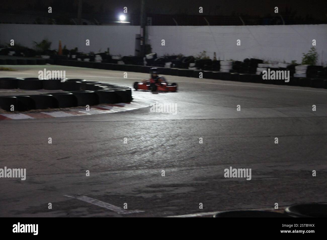 A thrilling go-kart race streaks through the Miami night. The driver ...