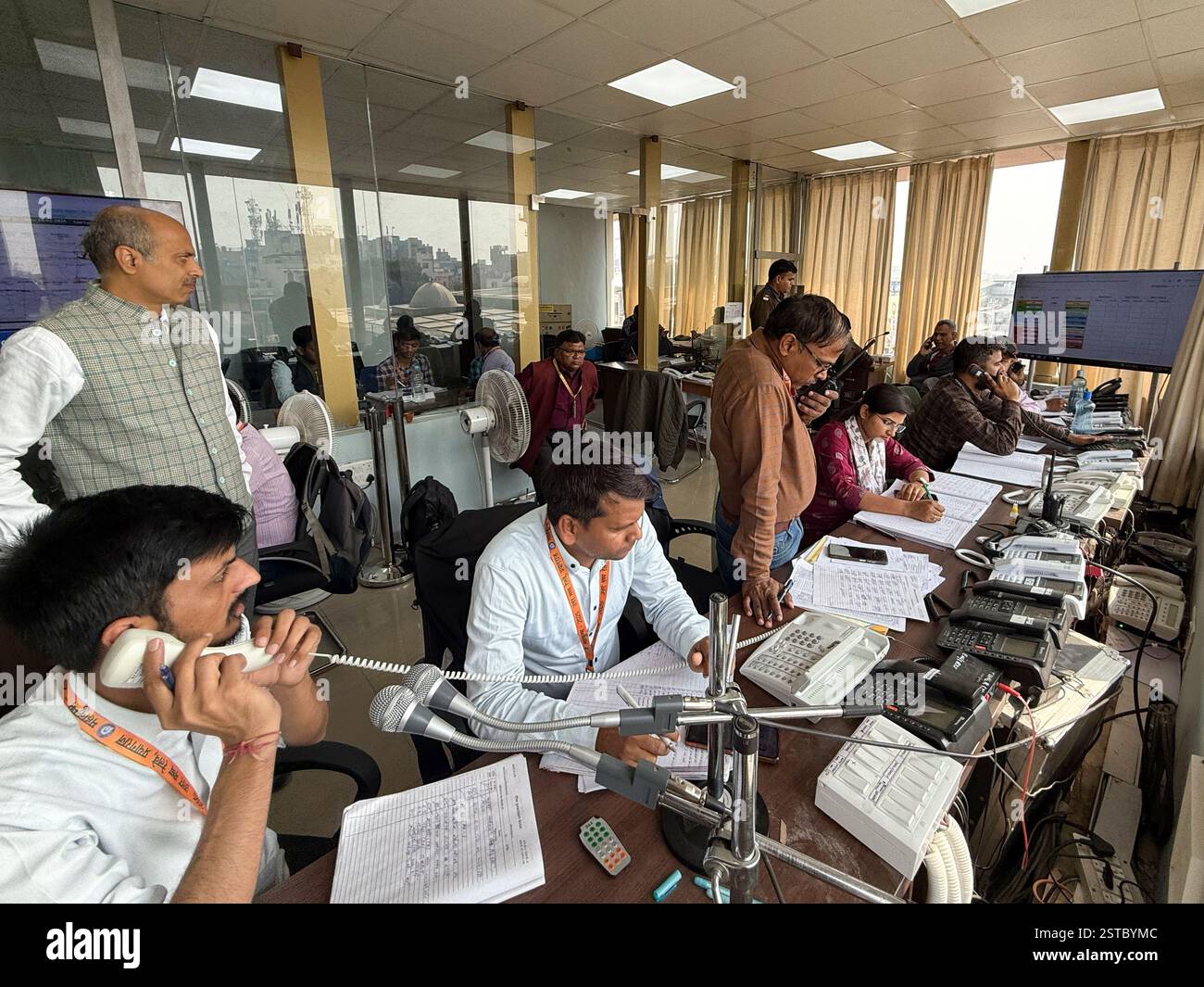 Indian railway employees work in the control room at Prayagraj Junction ...
