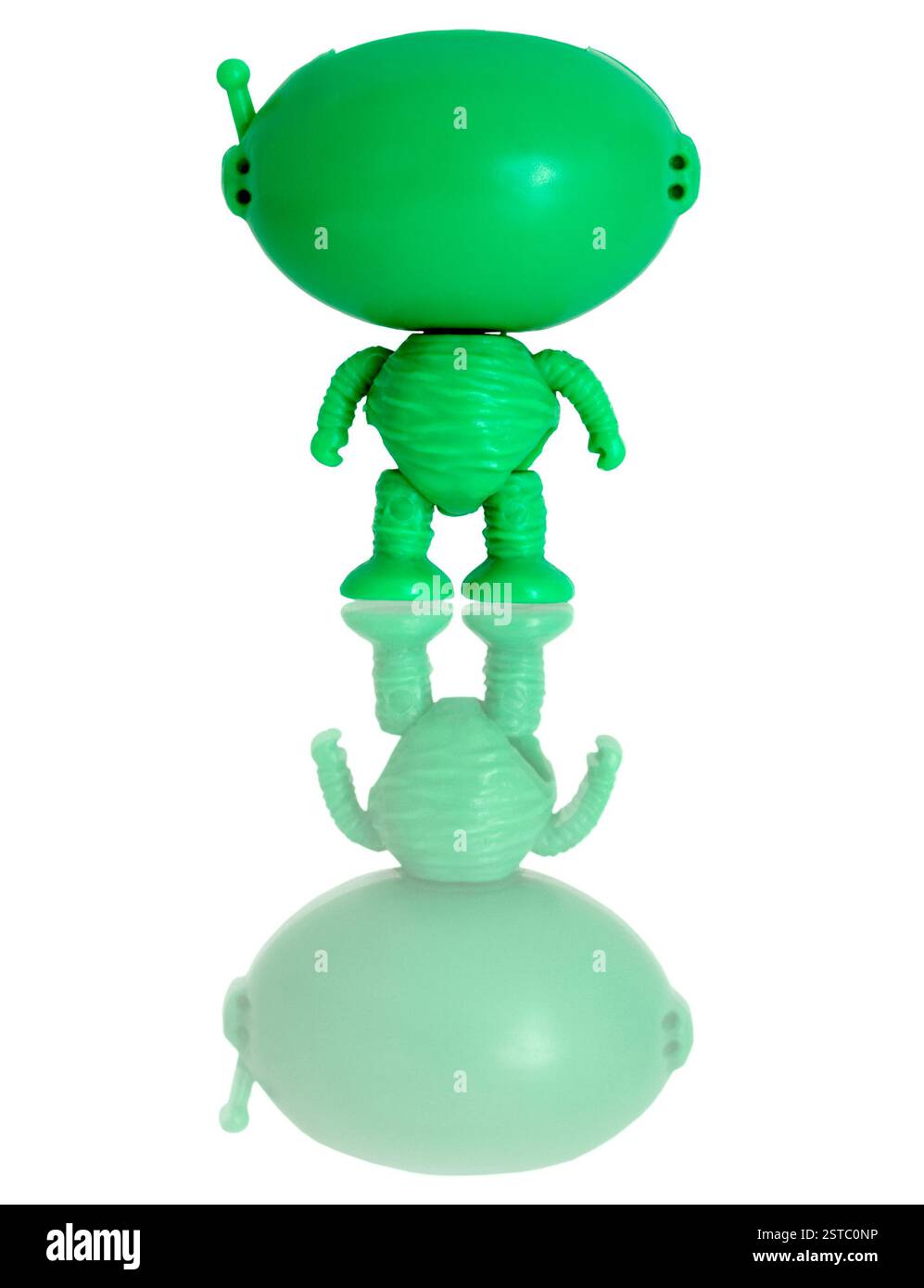 Plastic green figure of the alien Stock Photo - Alamy