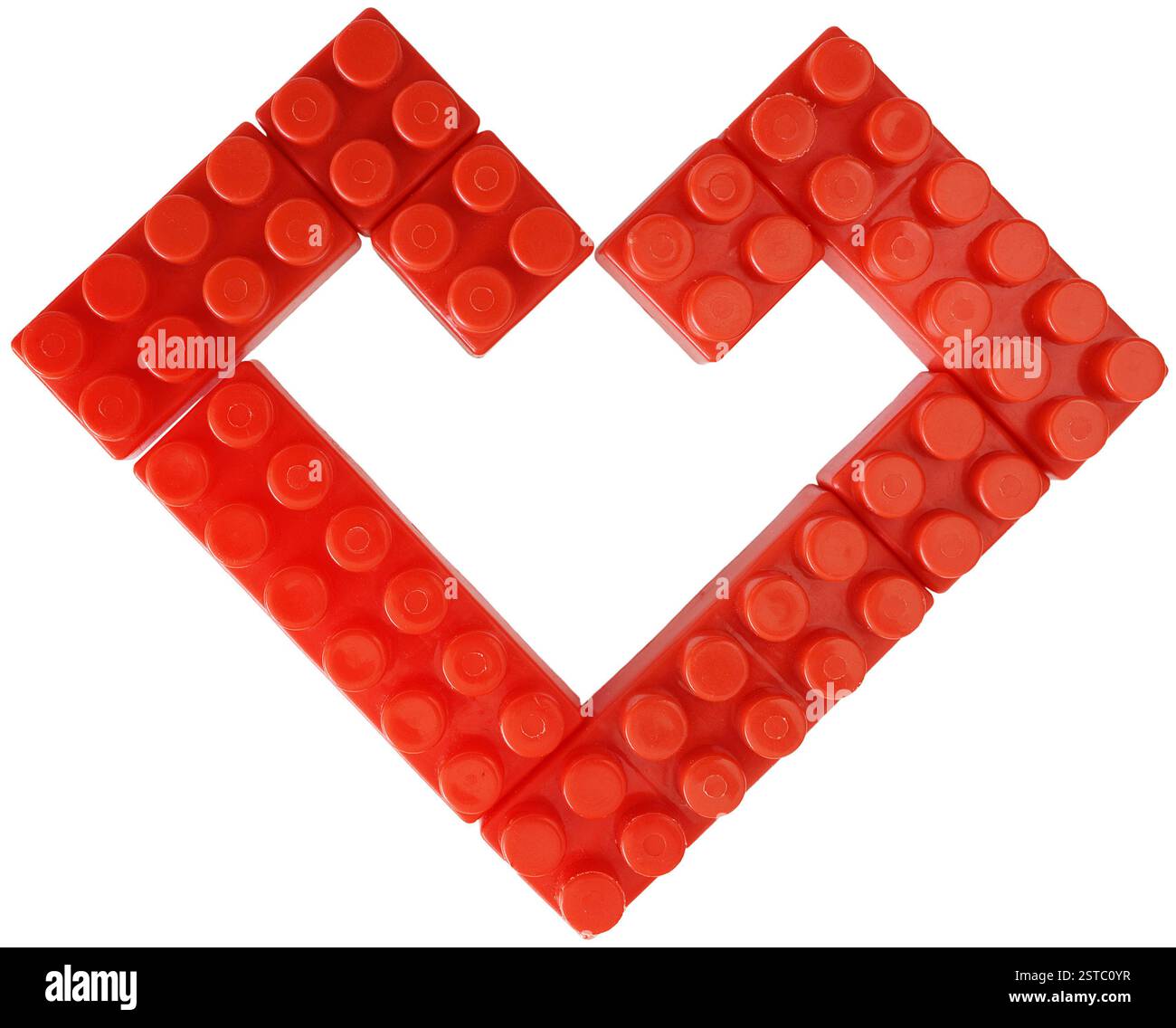 Red heart combined from details of the meccano on a white background ...