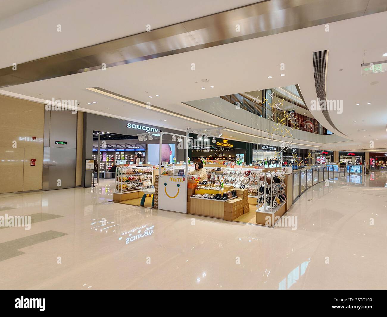 ShenZhen, China - February 12, 2025 : Bright interior of a shopping mall in coastal Shenzhen ...