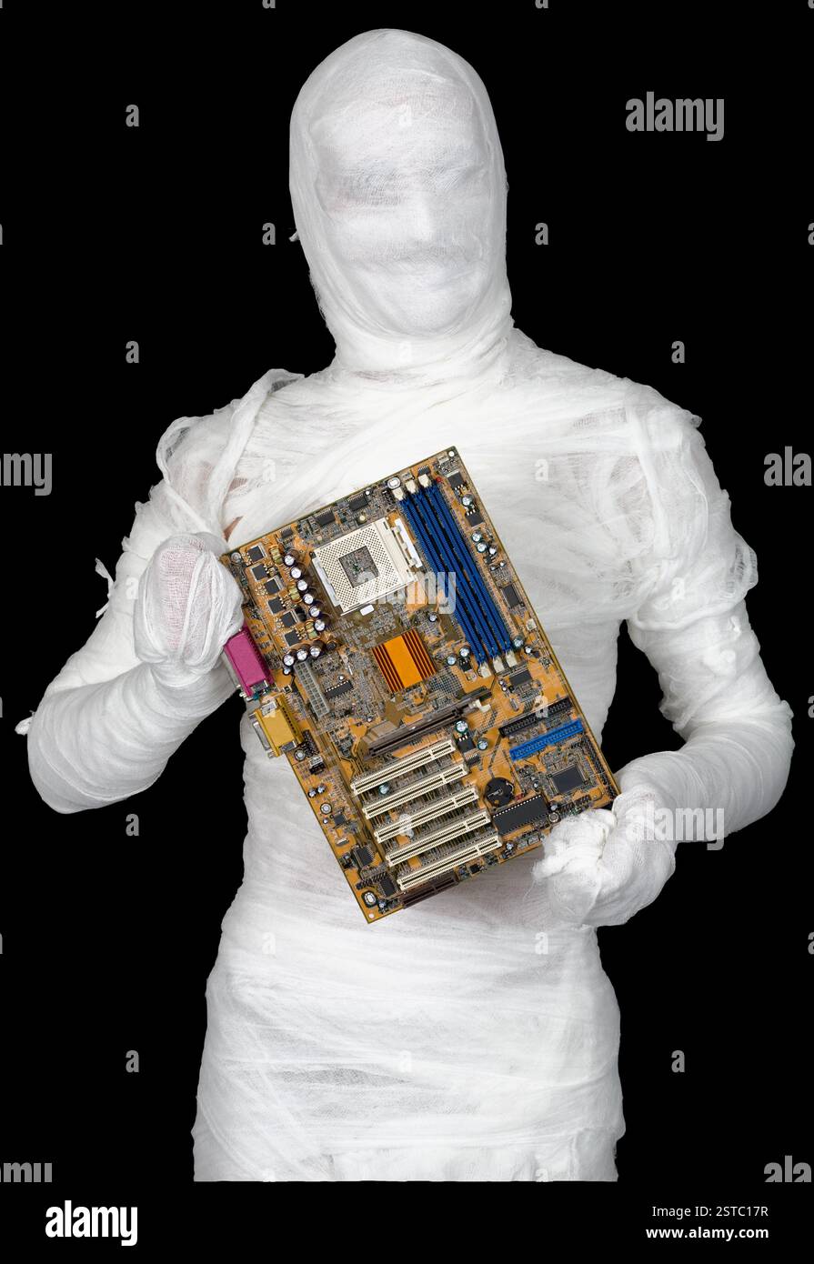 Man of bandaged with motherboard Stock Photo - Alamy