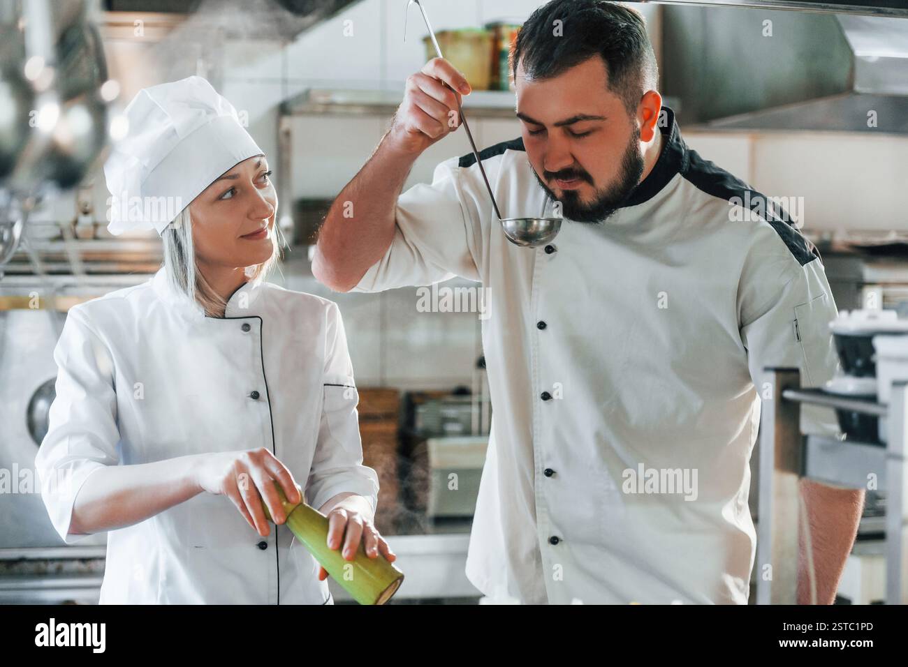 Chef preparing delicious soup hi-res stock photography and images - Alamy