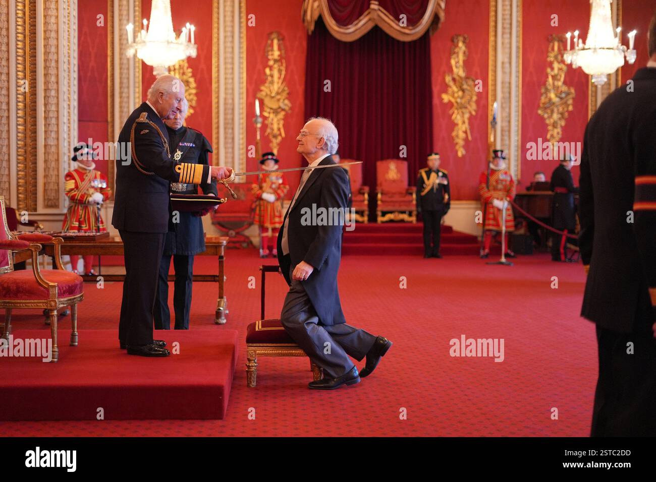 Sir John Rutter, Composer, is made a Knight Bachelor by King Charles III at Buckingham Palace ...