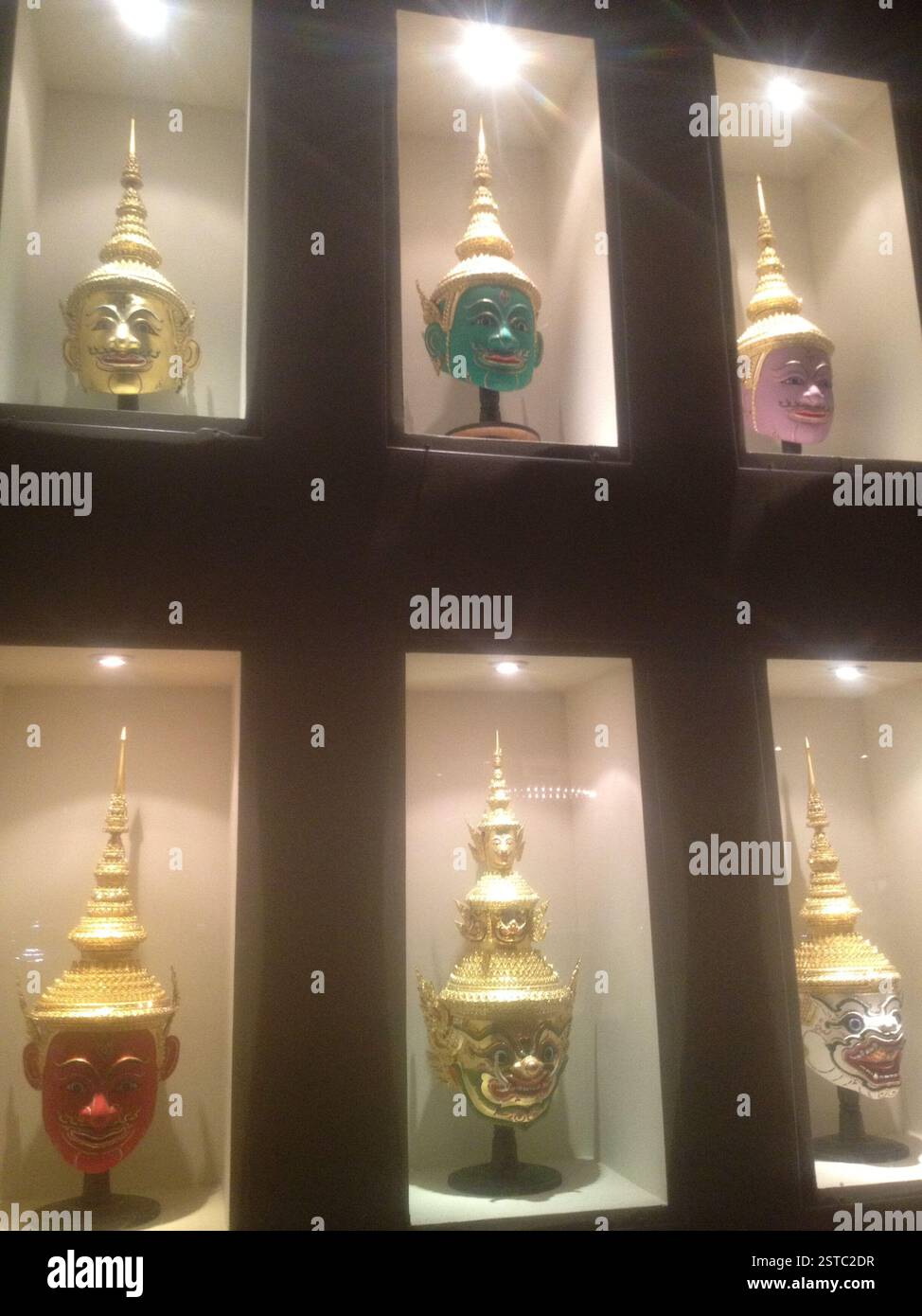 Display case filled with colorful masks Miami. World cultures on ...